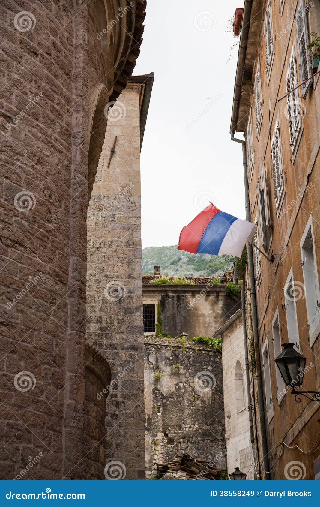 Red Blue and White Flag in Kotor Alley Stock Image - Image of wall ...