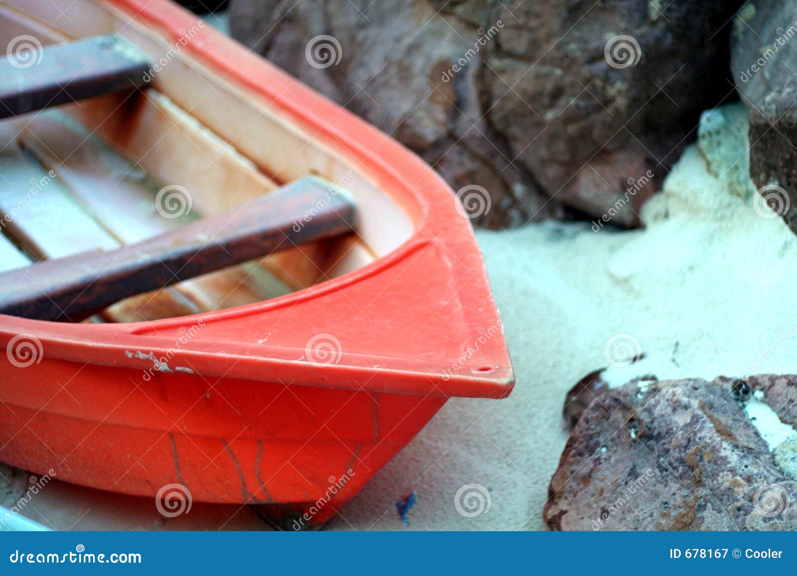 Red boat and beach rocks stock image. Image of rowboat - 678167