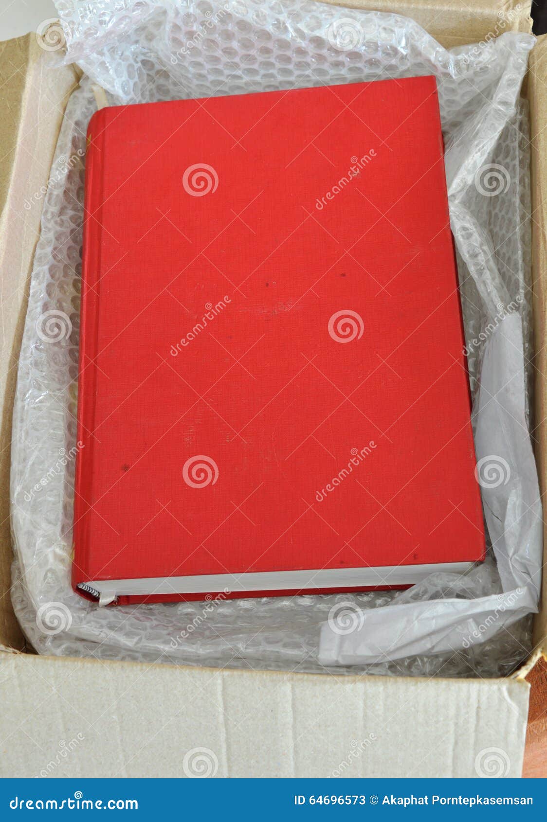 Red Book in Brown Paper Box Stock Image - Image of absorb, mail: 64696573