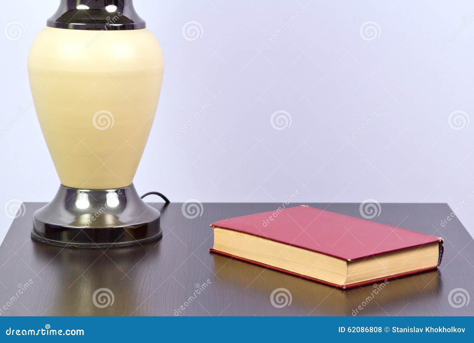 The Red Book on the Coffee Table Stock Photo - Image of wood, table ...