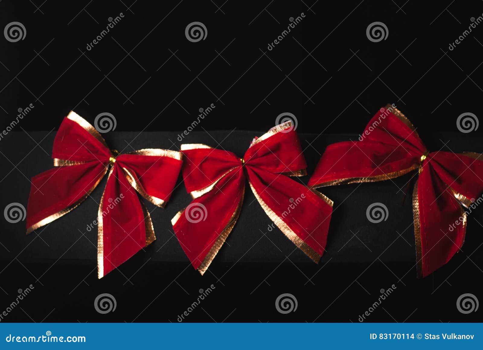 Red Bow on a Black Background, Stock Photo - Image of brilliant, object ...
