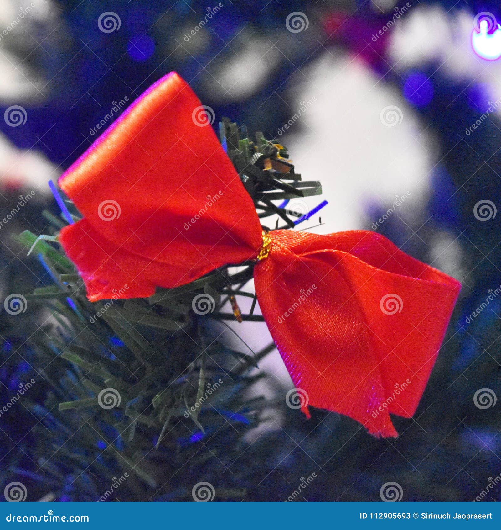 Red bow on Christmas tree stock image. Image of season - 112905693