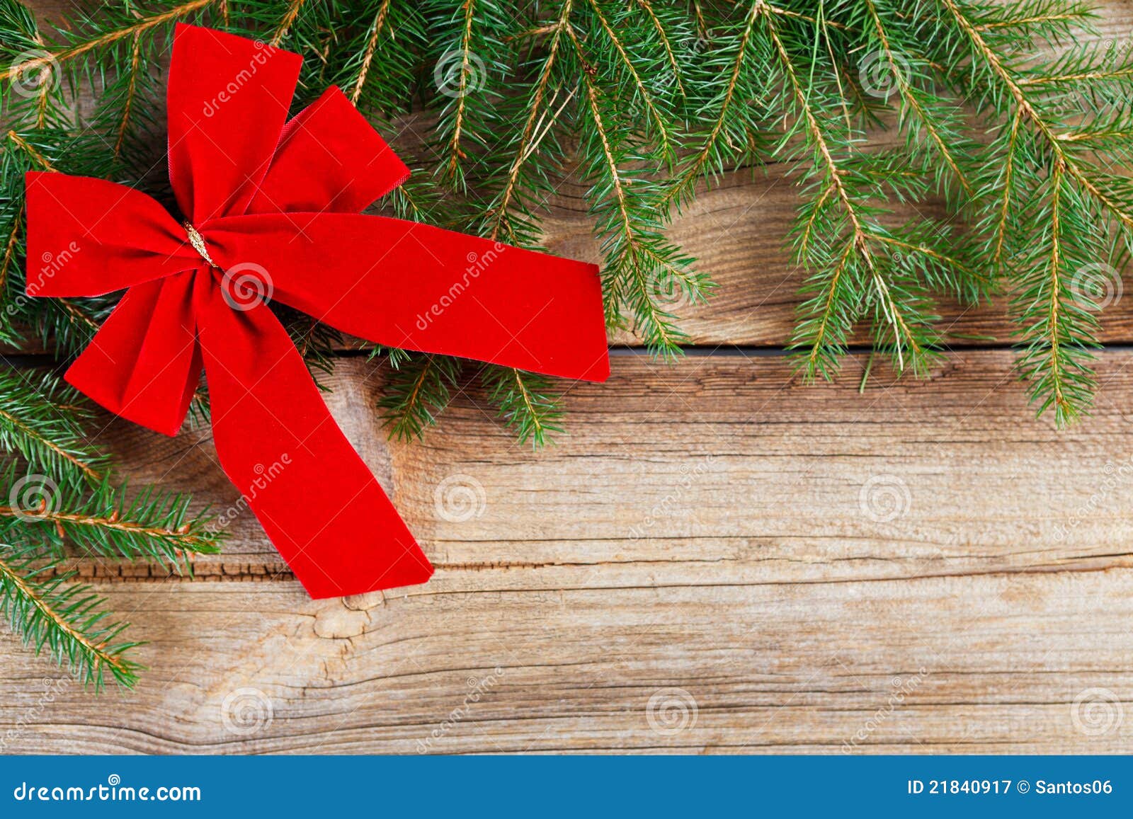Red Bow and Fir Tree Branch on Wooden Board Stock Image - Image of ...