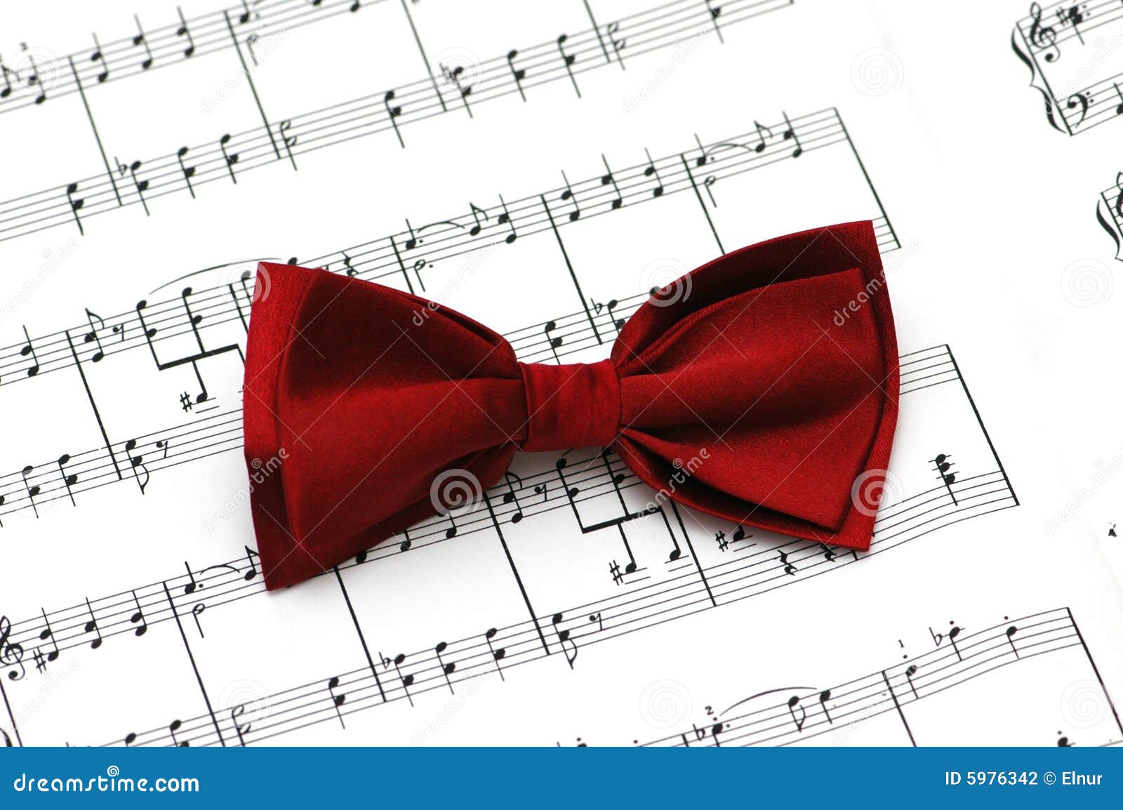 Red Bow Tie on Musical Notes Paper Stock Photo - Image of melody, close ...