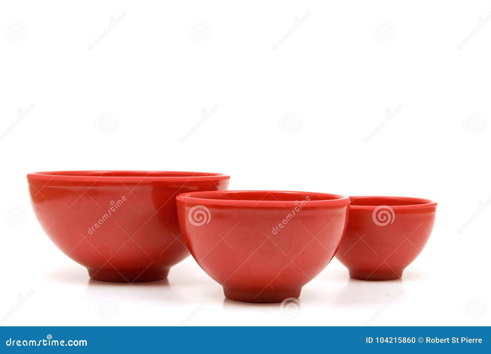 Red Bowls of Different Sizes on White Background Stock Photo - Image of ...