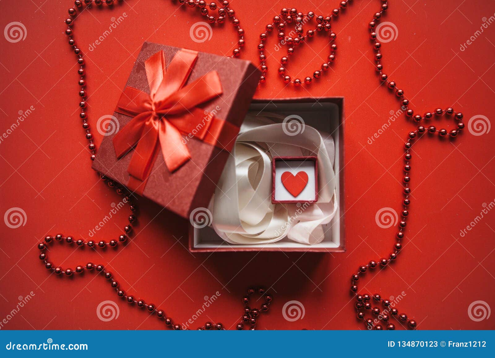 Red Box and Inside it is Another Small Box with a Heart. Stock Image ...