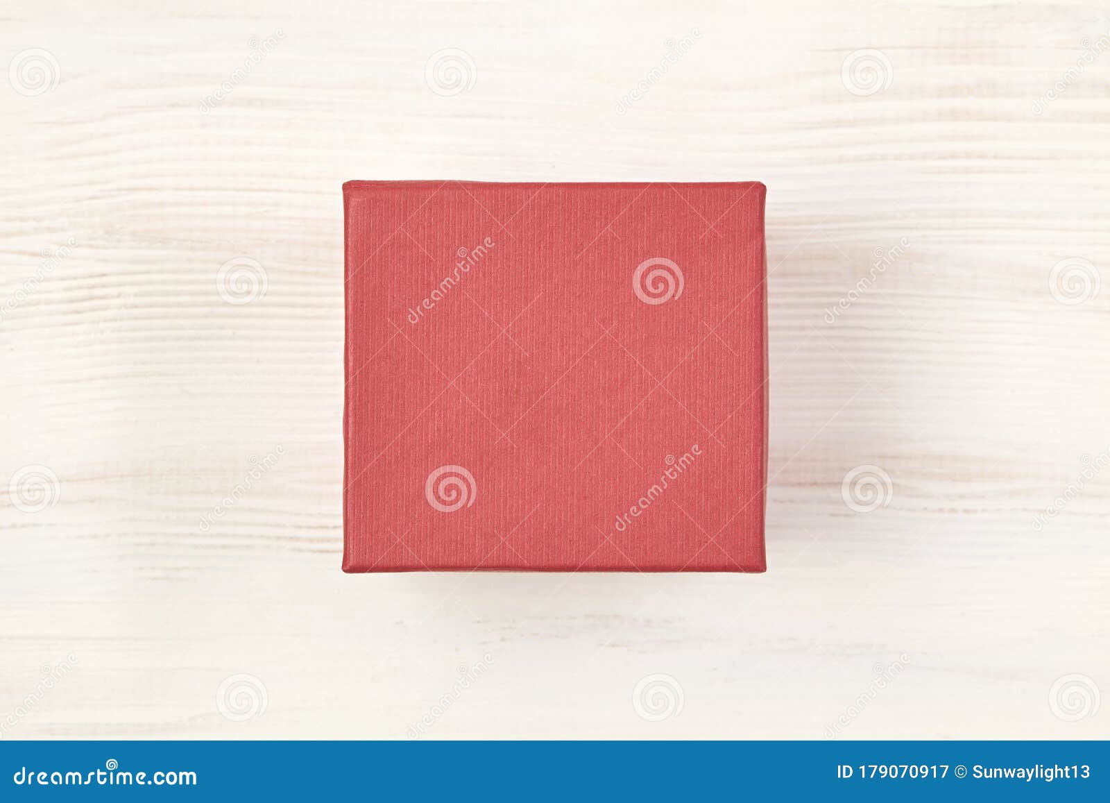 Red Box on White Wooden Background. Top View with Copy Space Stock ...