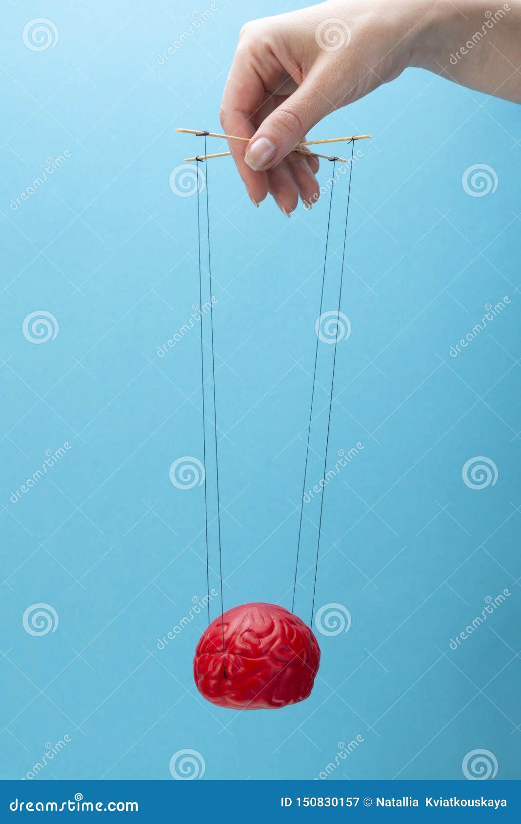 A Red Brain on a Blue Background, a Hand that Manipulates the Mind Like ...