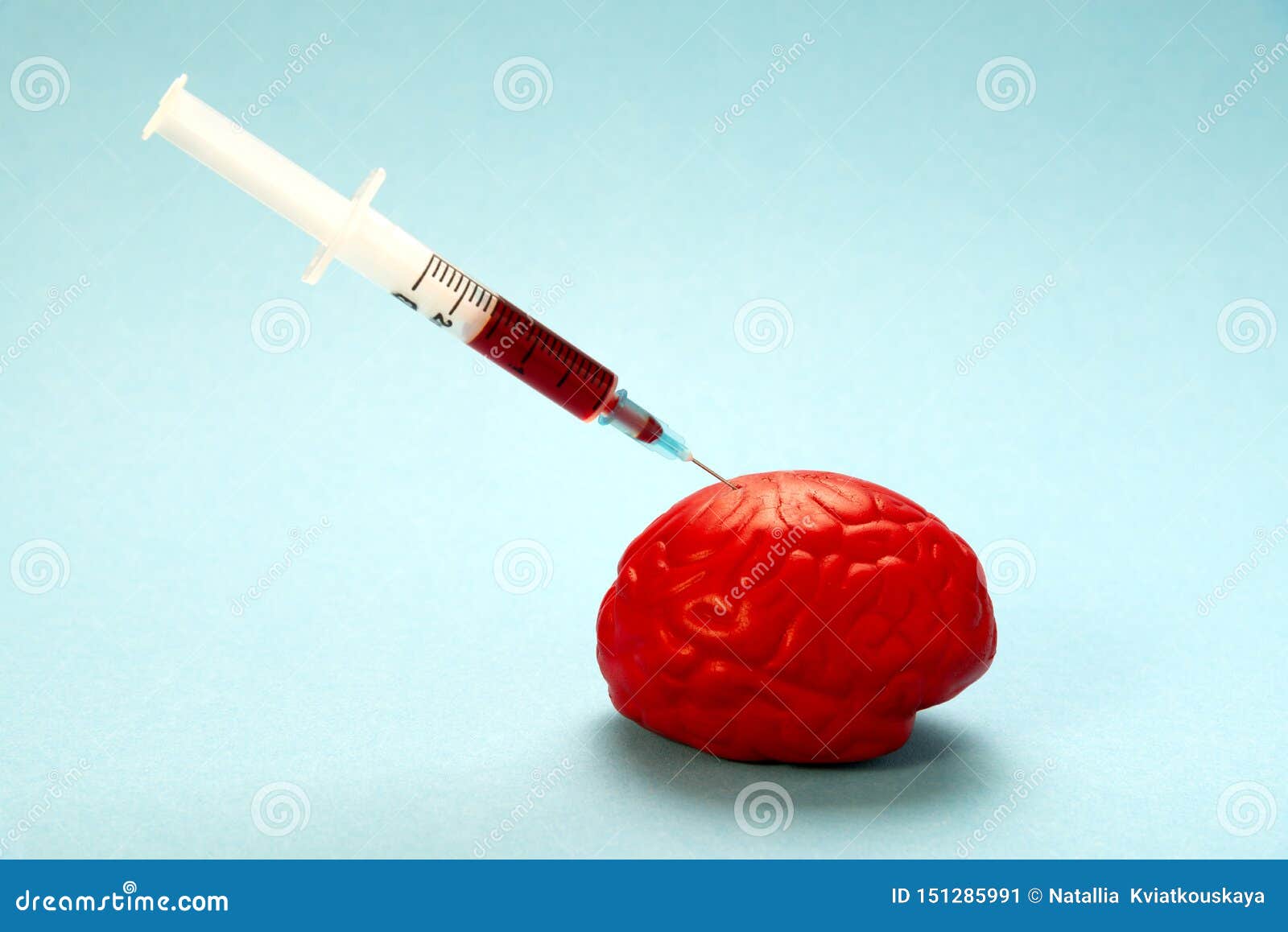 Red Brain on a Blue Background with a Nootropic Syringe. Injection into ...