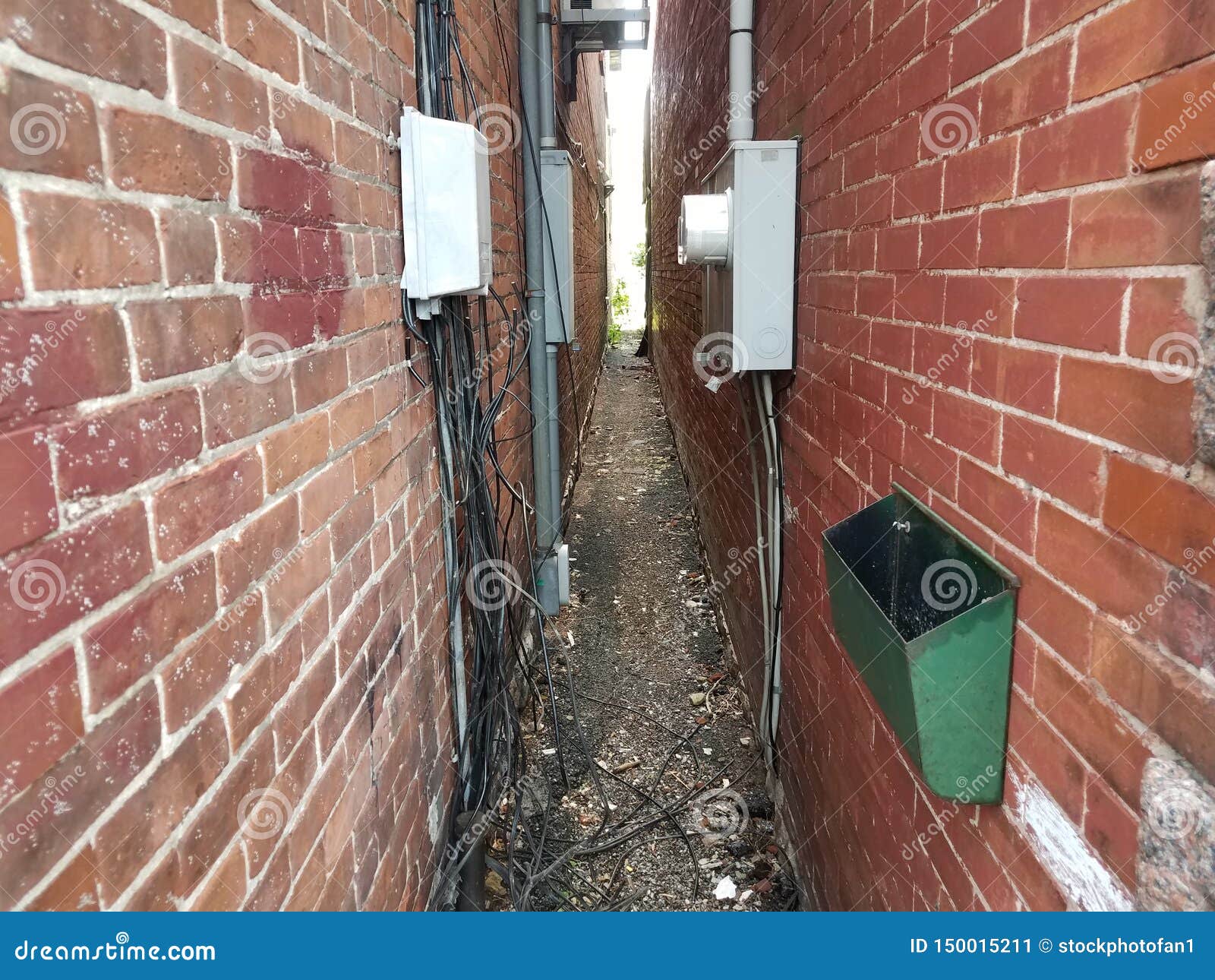 Red Brick Alley with Electrical Cables and Meters Stock Image - Image ...