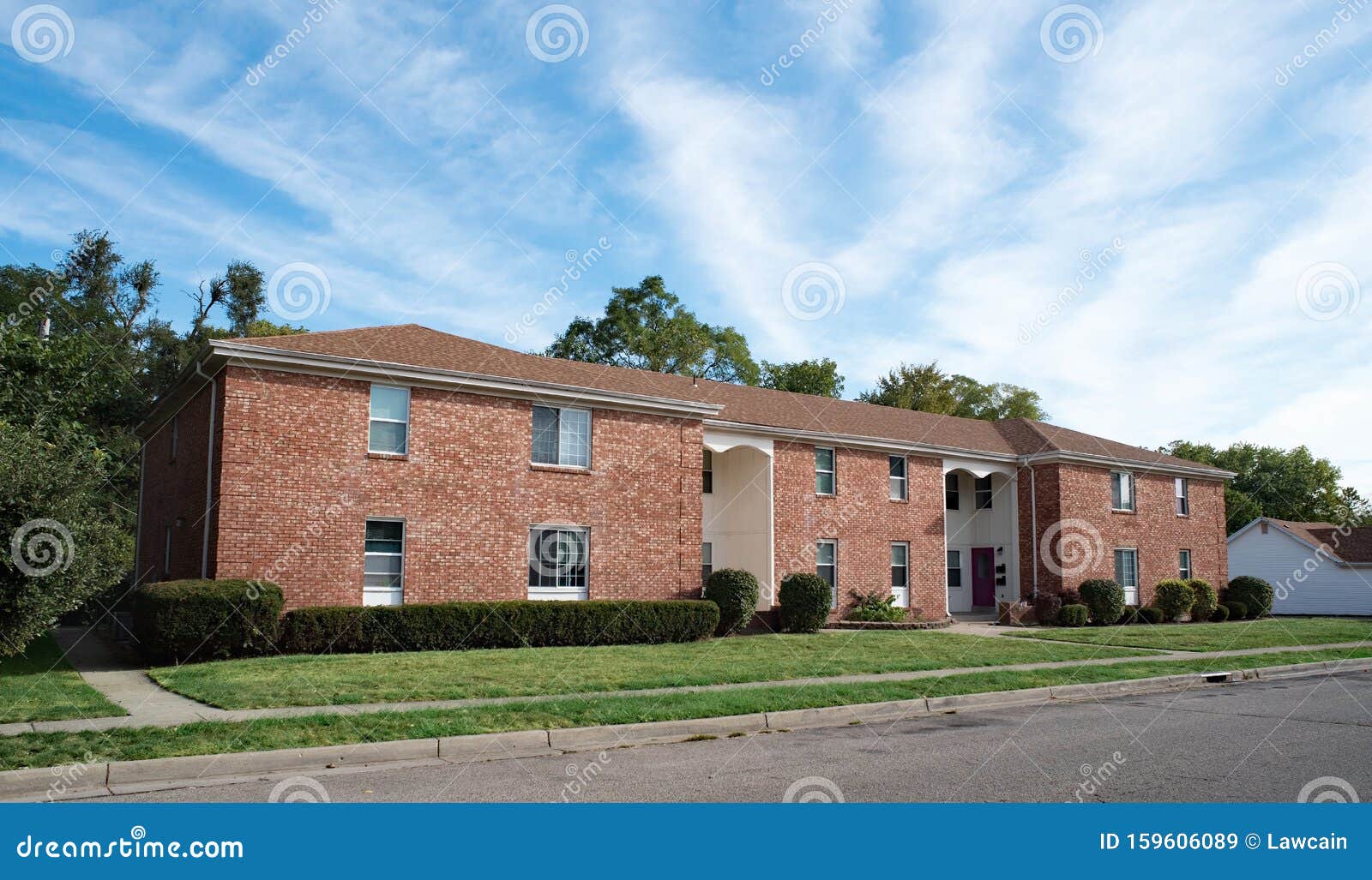 Red Brick Apartment Complex Stock Image - Image of clouds, apartment ...