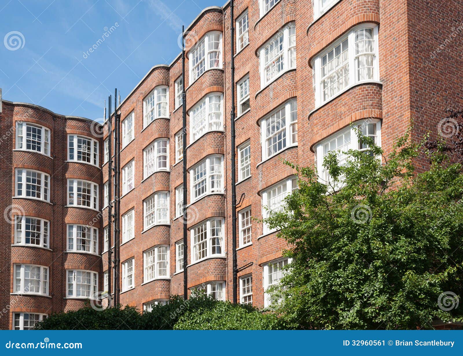 Red brick apartments. stock image. Image of brick, multi - 32960561