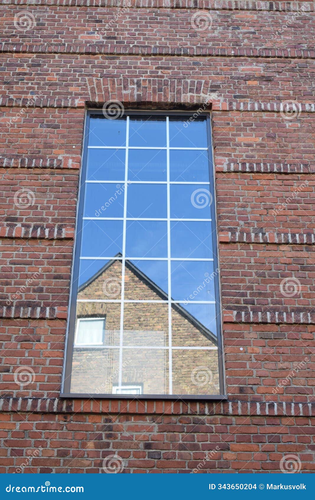 Red Brick Building with an Other Brick Building Reflected in the Window ...