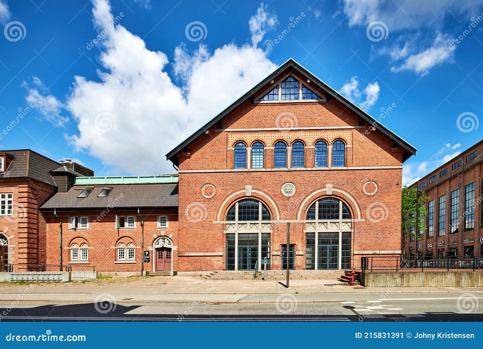 A Red Brick Building with Round Windows Editorial Photo - Image of ...