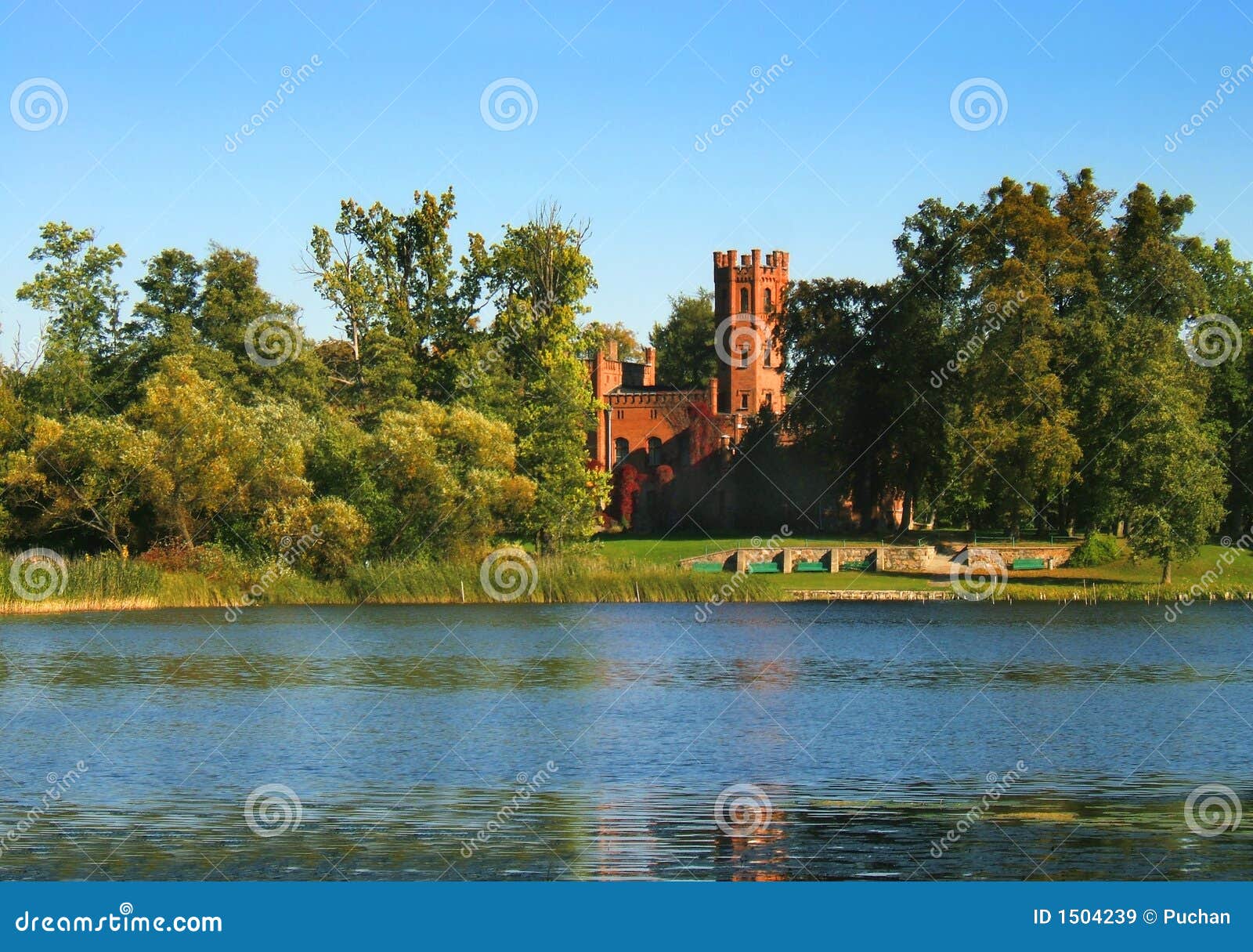 Red brick castle stock image. Image of blue, water, sorkwity - 1504239
