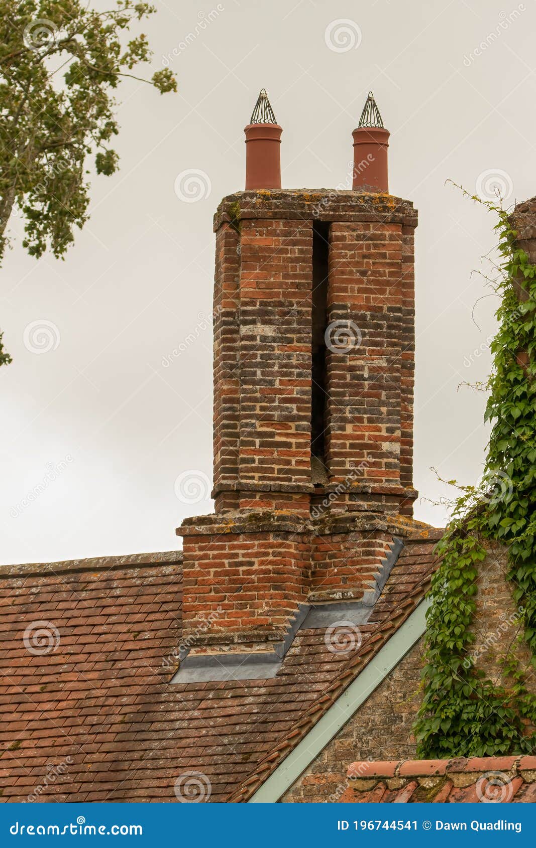 Vintage Red Brick Chimney Double Stack on English Tiled Rooftop Stock ...