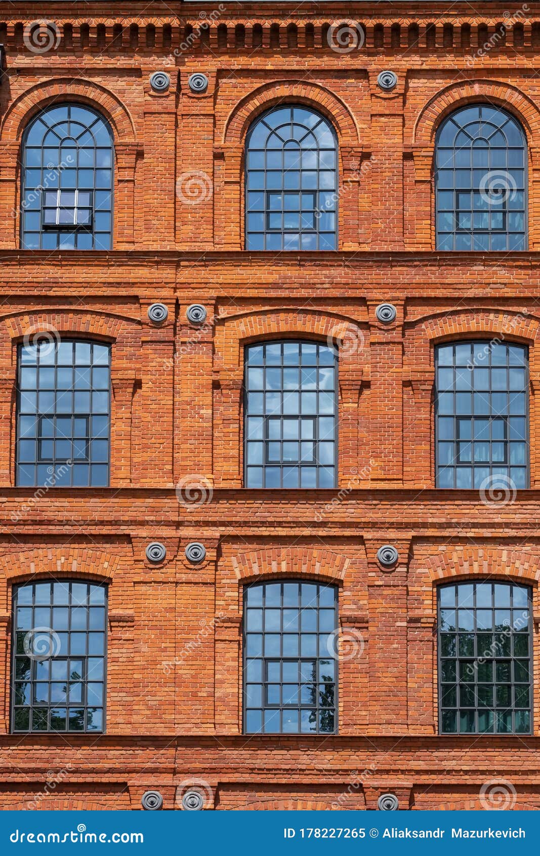 Red Brick Classic Industrial Building Facade with Multiple Windows ...