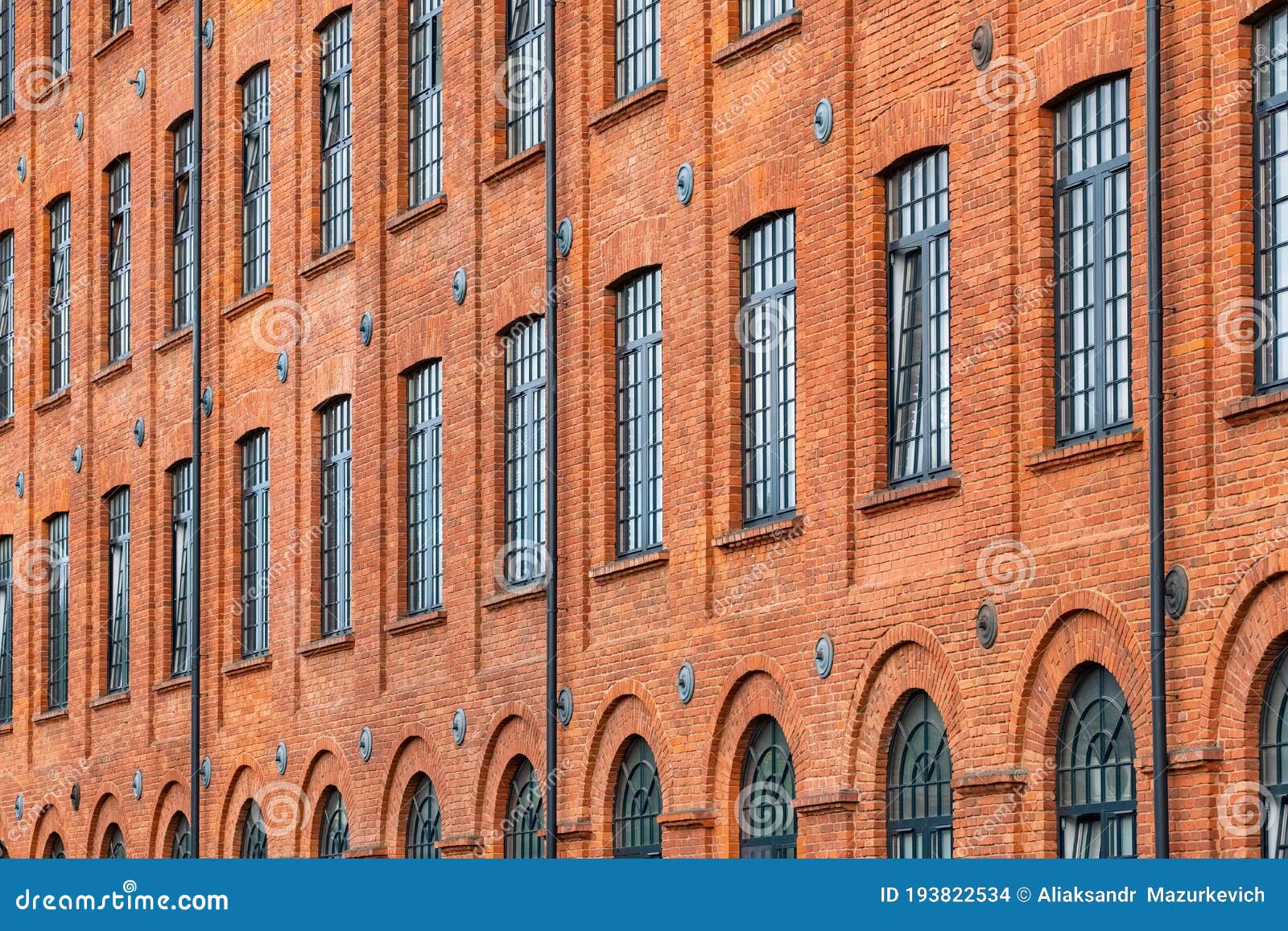 Red Brick Classic Industrial Building Facade with Multiple Windows ...