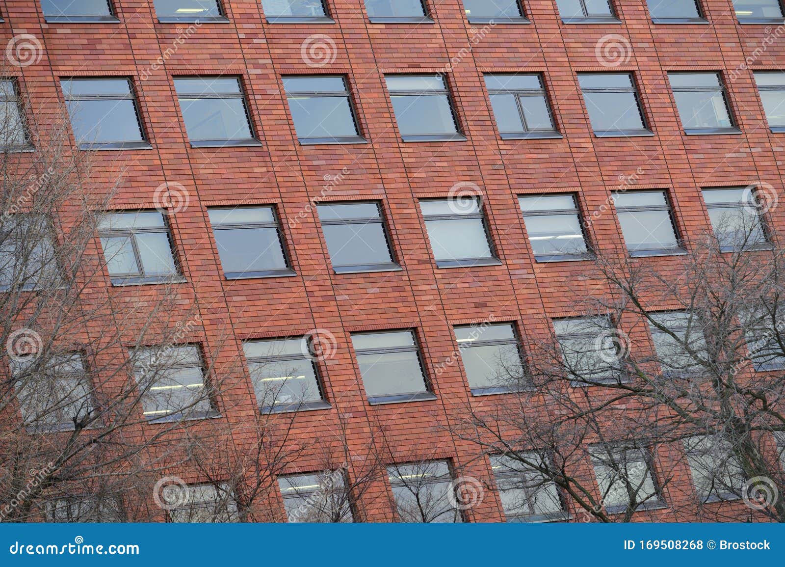 Red Brick Classic Industrial Building Facade with Multiple Windows ...