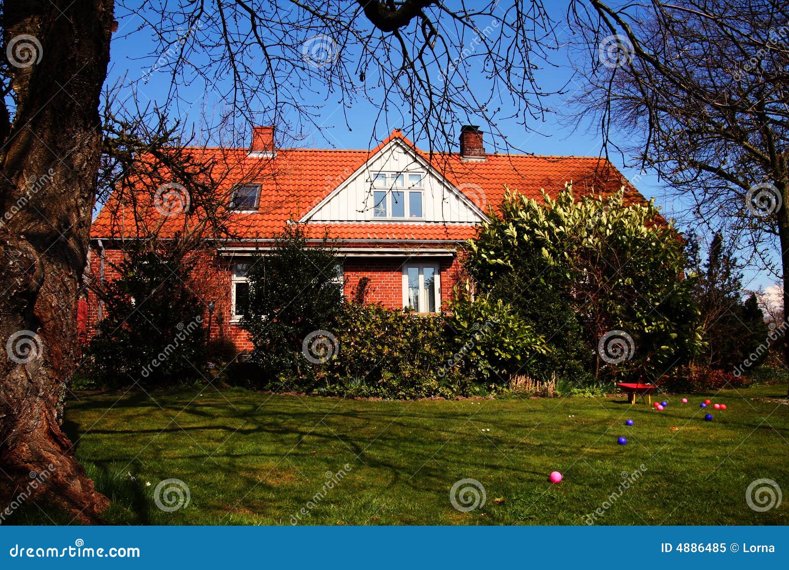 Red brick house and garden stock image. Image of facade - 4886485