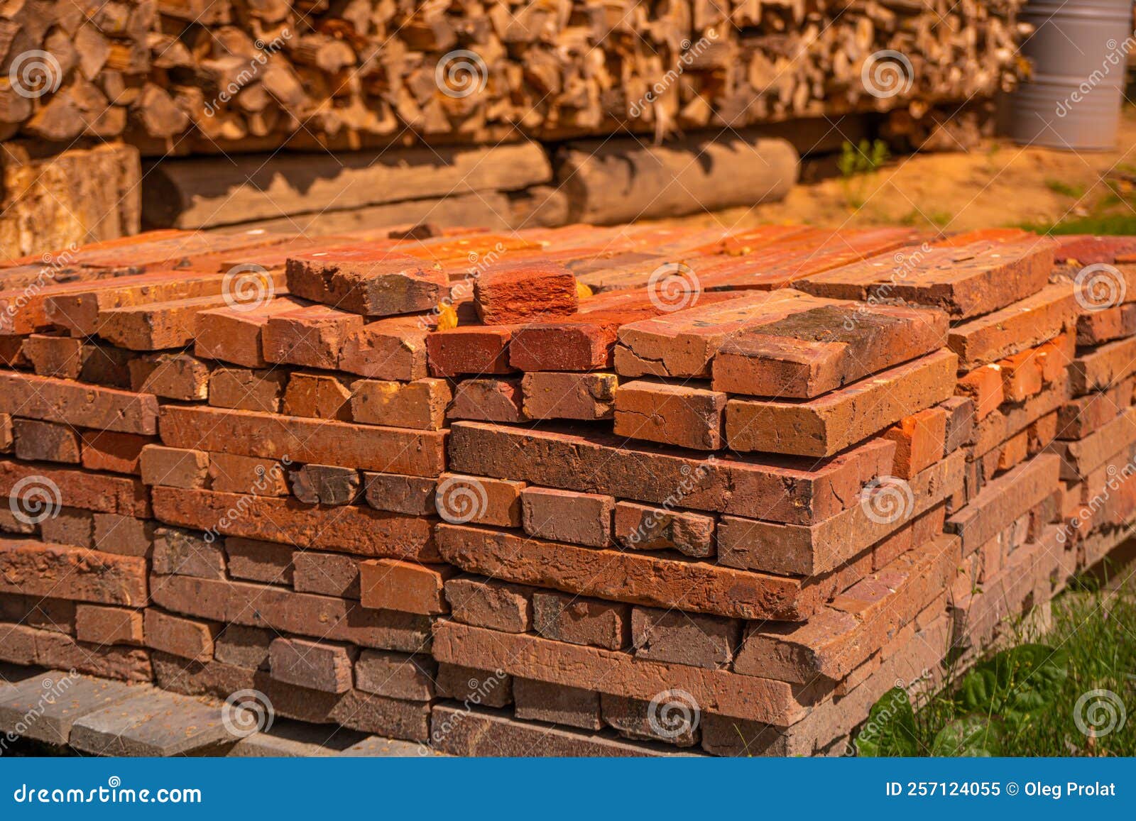 Red Brick Packed in Stack are Stored on Ground Outdoors at a Hardware ...