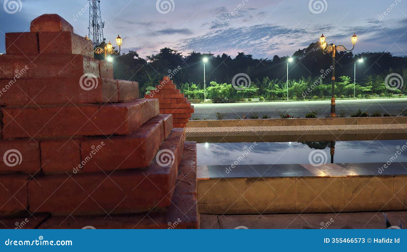 Red Brick Structure Near Tranquil Water at Dawn Stock Image - Image of ...