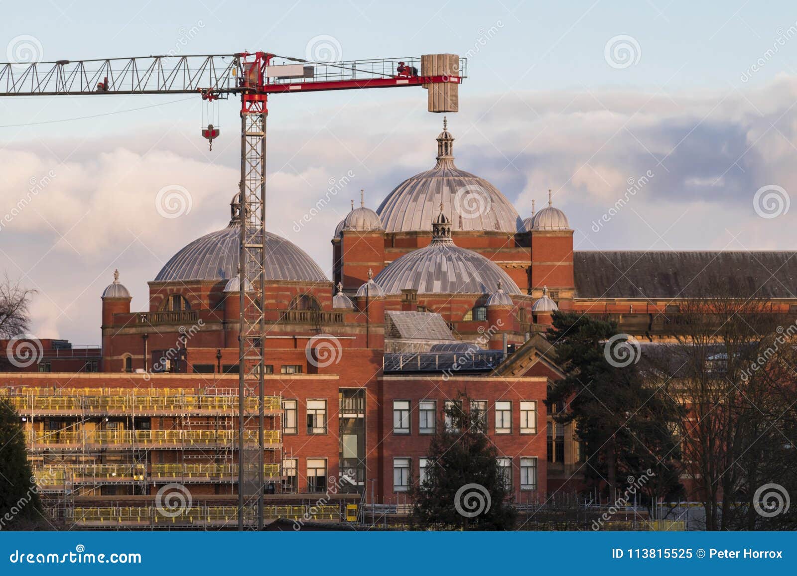 Red Brick University and Construction Crane Stock Image - Image of ...
