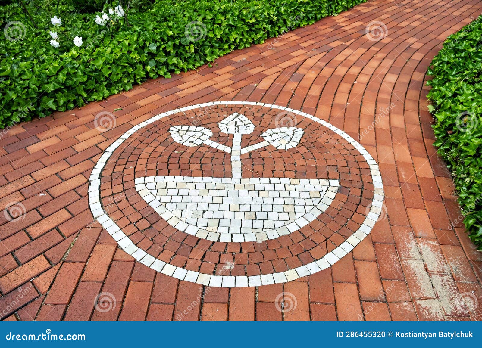 Red Brick Walkway with White Circle with Tree in the Center in Germany ...