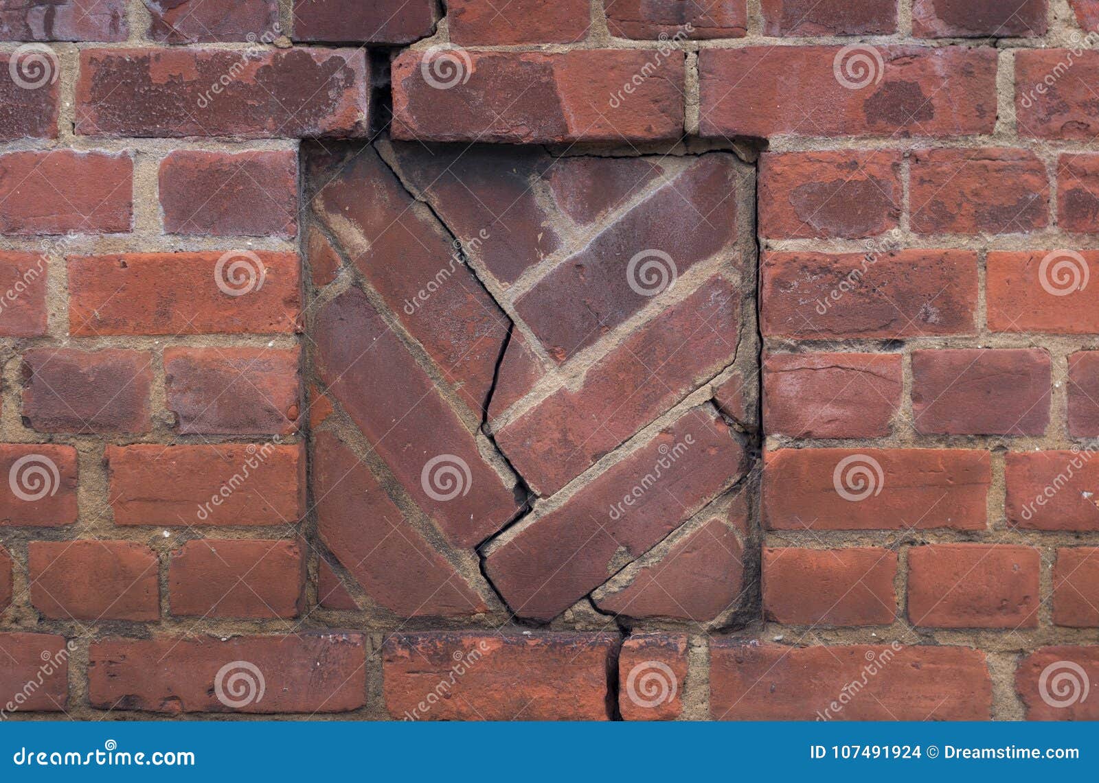 Red Brick Wall with Crack stock photo. Image of grunge - 107491924