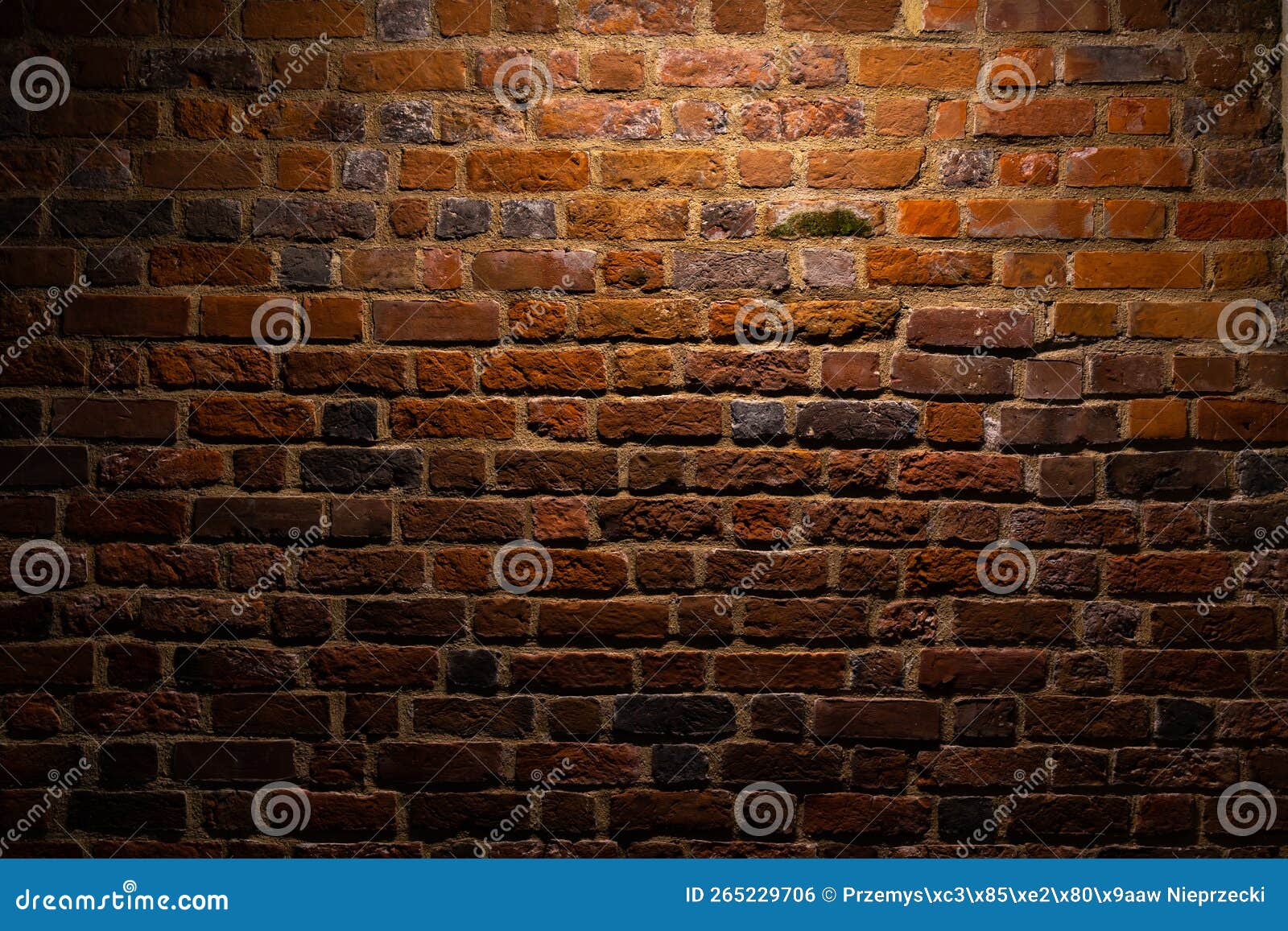 A Red Brick Wall Illuminated at Night. Stock Photo - Image of night ...