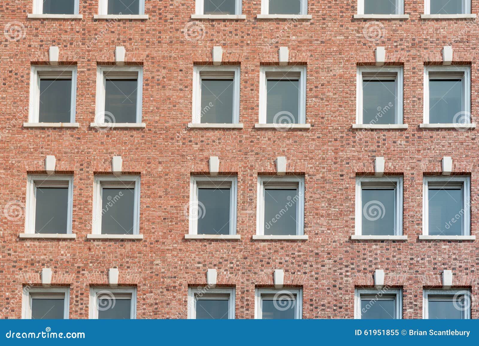Red Brick Wall with Rows of Windows Stock Image - Image of regular ...