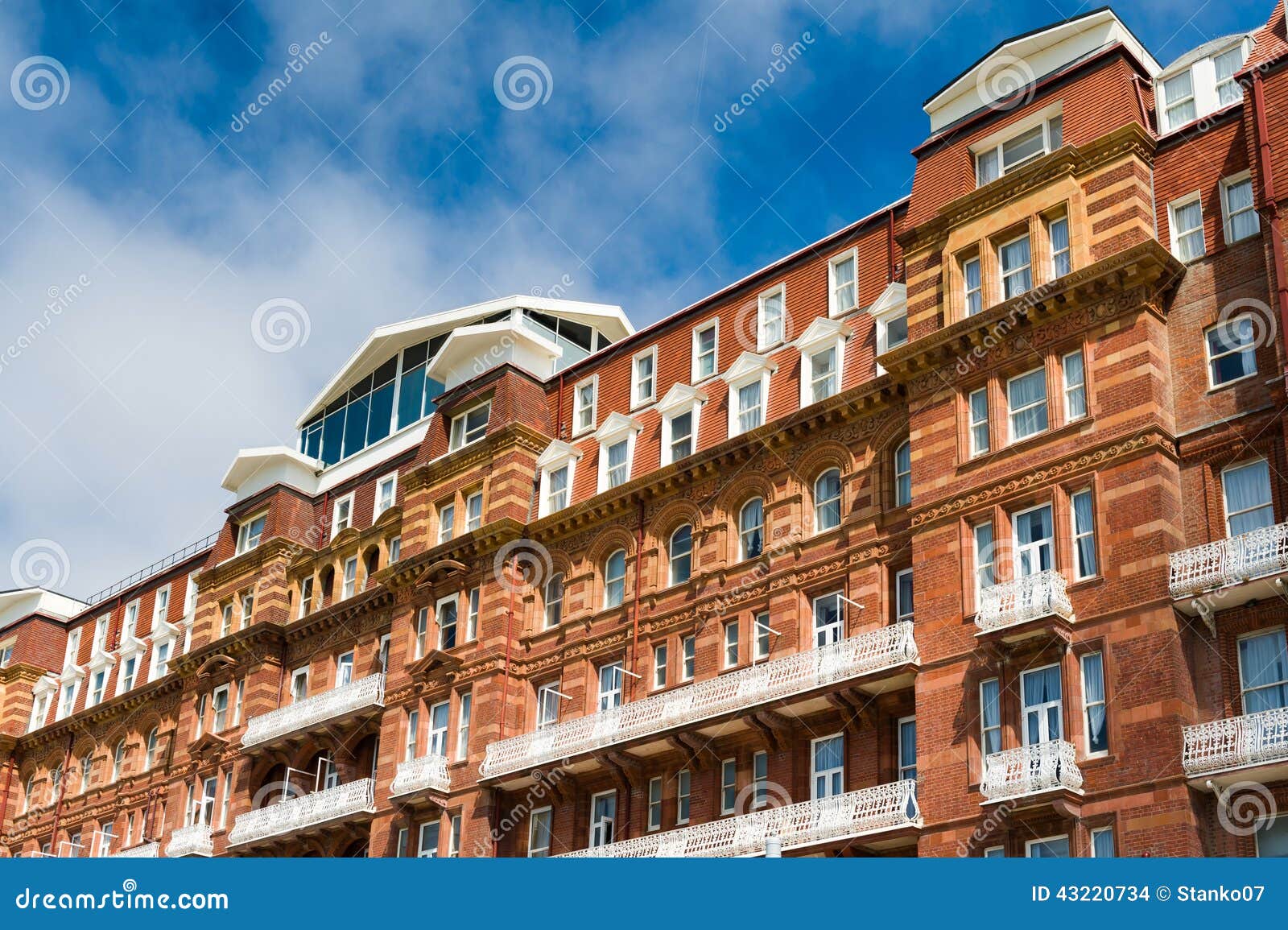 Red-bricked building stock photo. Image of culture, balconies - 43220734