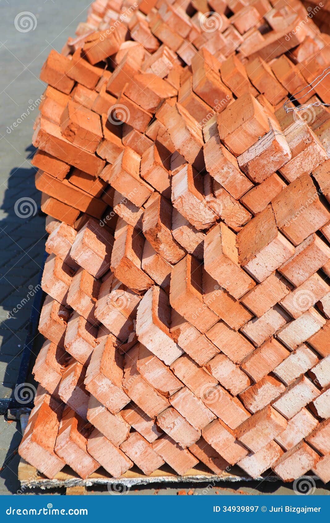 Red bricks laid in pallets stock image. Image of exterior - 34939897