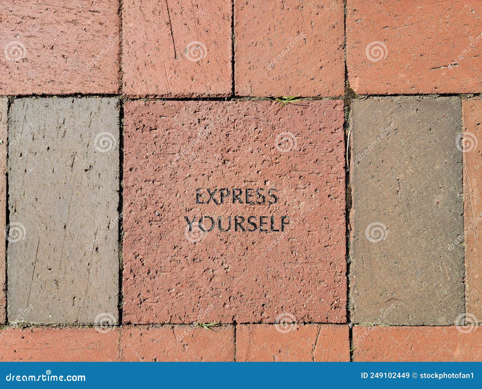 Red Bricks or Masonry on Ground with Express Yourself Engraved Stock ...