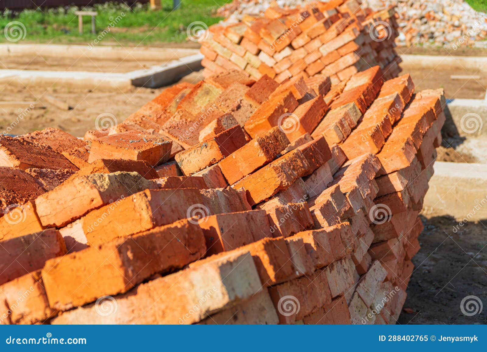 Red Bricks Stacked at a Construction Site. Construction of Brick Houses ...