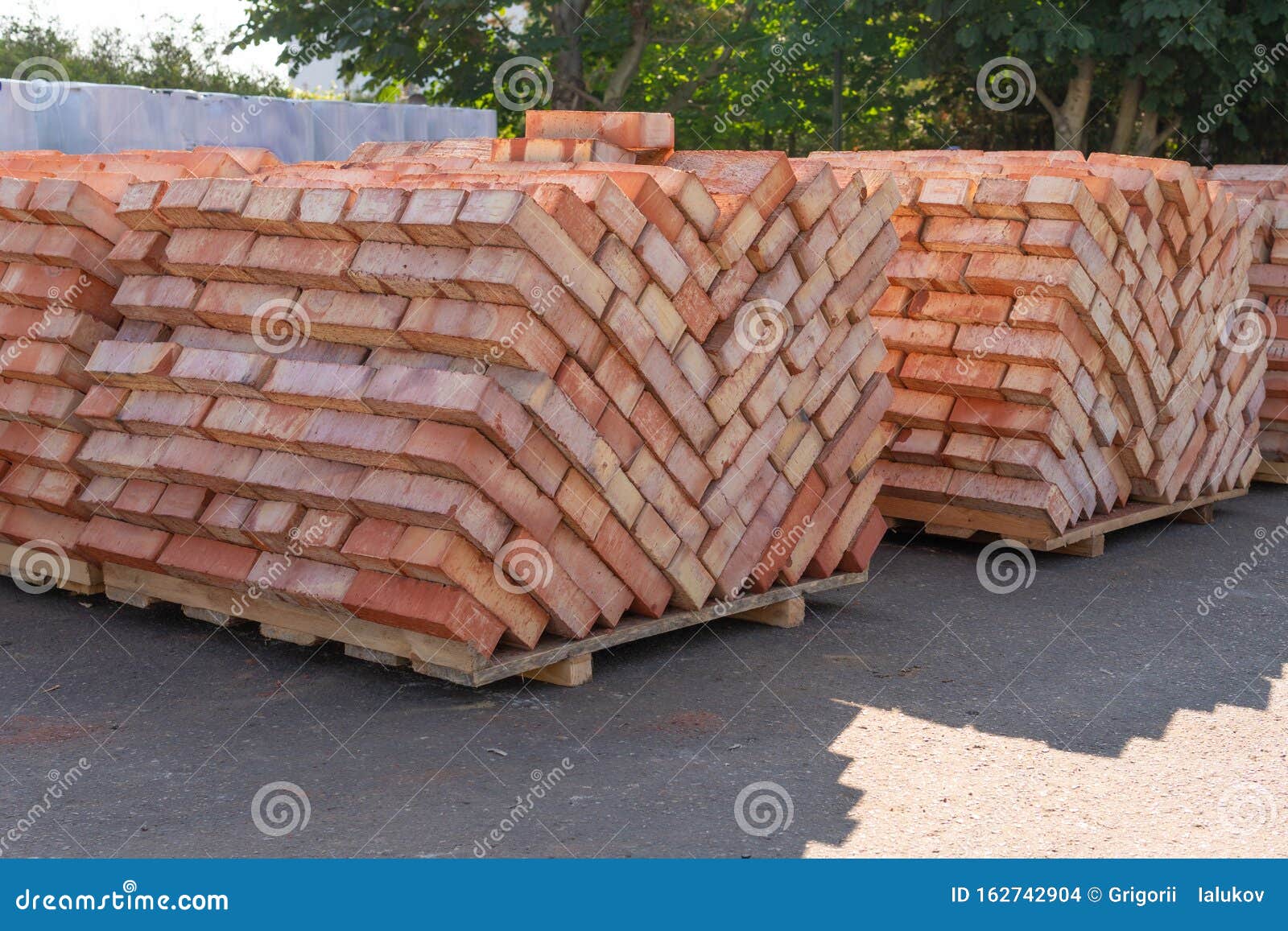 Brown Bricks Stacked Together To Build a House Stock Photo - Image of ...