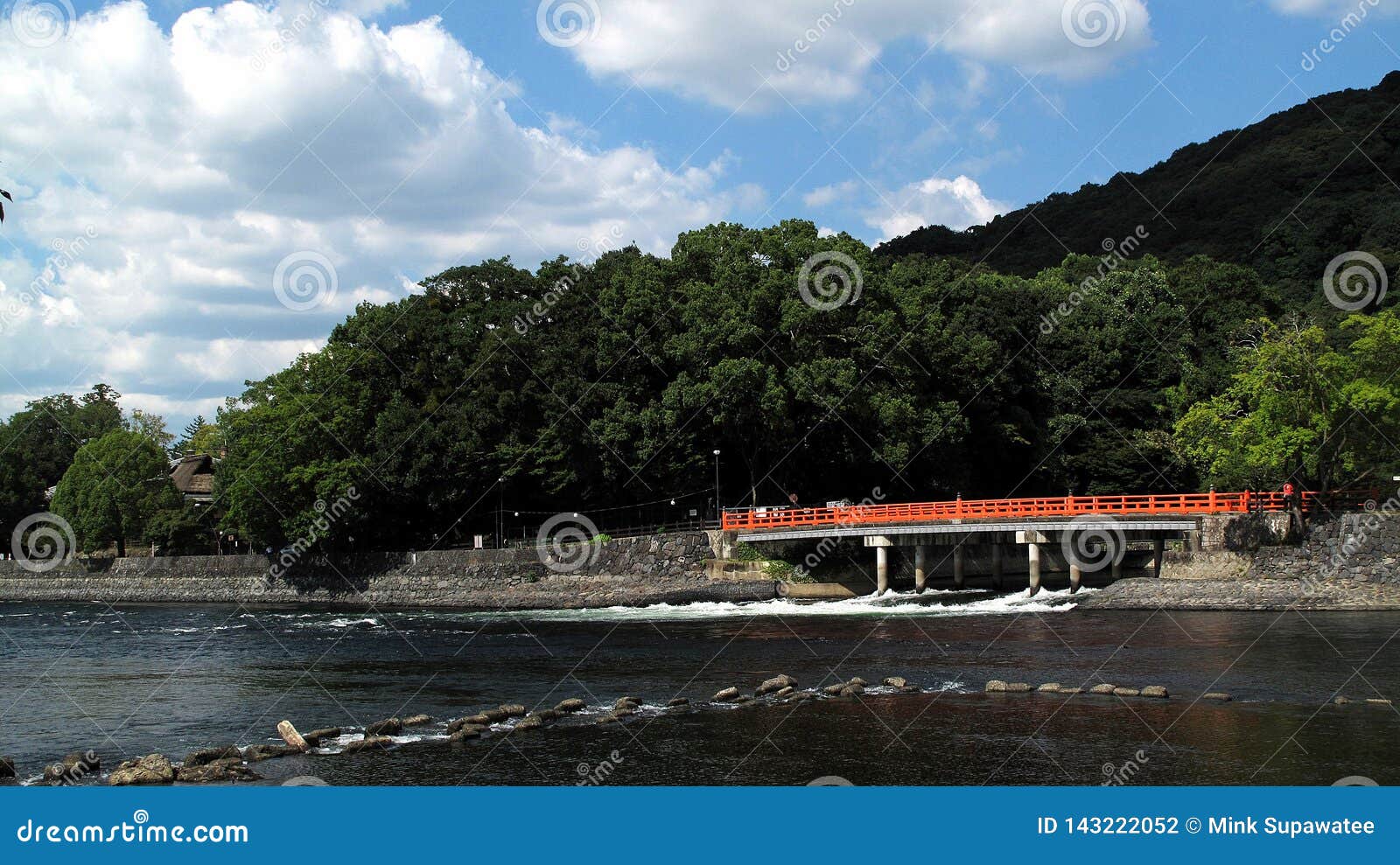 Red Bridge Crossing Shallow River among Green Environment. Stock Photo ...