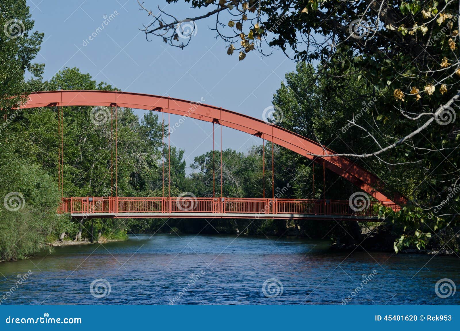 Red Bridge Extending Over the River Stock Photo - Image of river, steel ...
