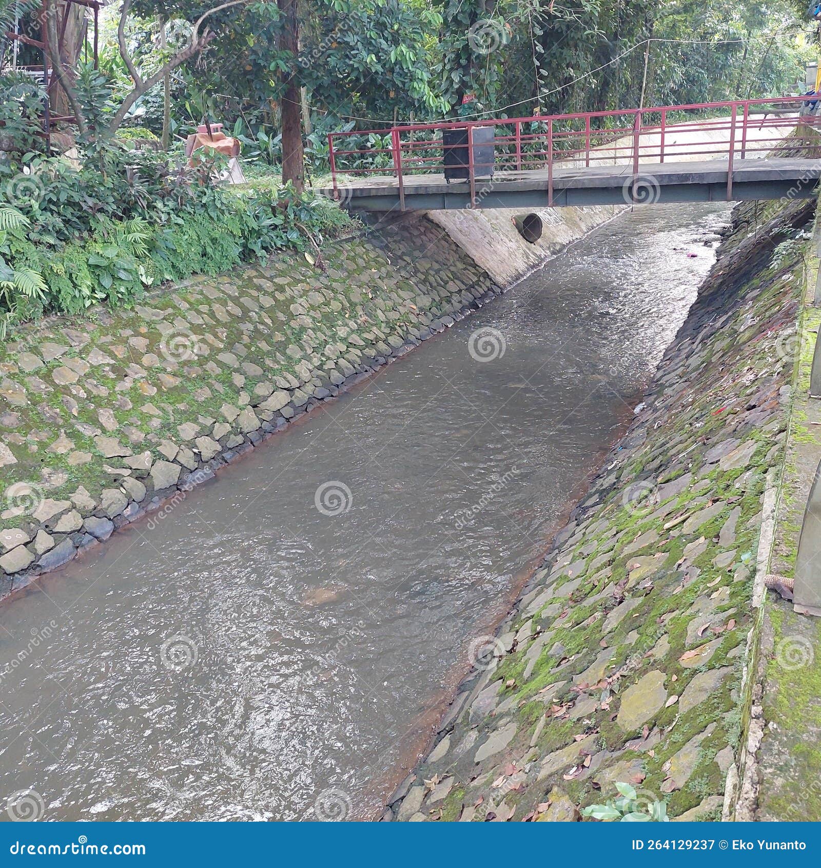 Red Bridge Over the River with Clear Water Stock Image - Image of ...
