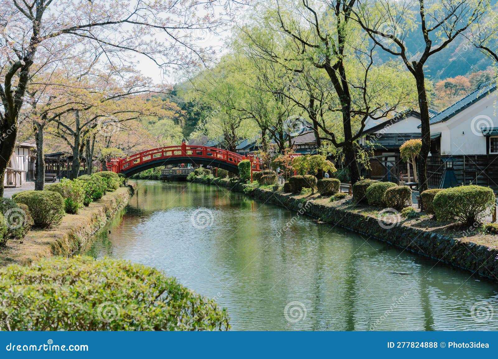 Red Bridge Over the River in Edo Wonderland, Japan Stock Photo - Image ...