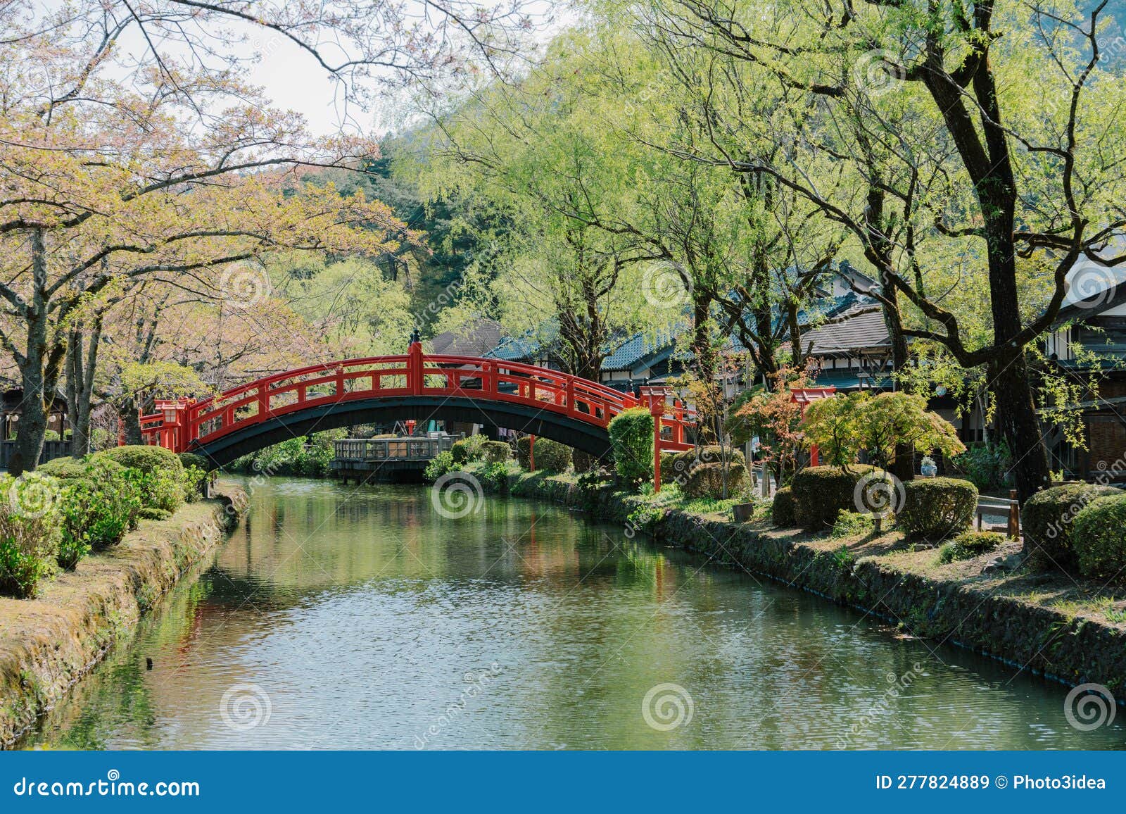 Red Bridge Over the River in Edo Wonderland, Japan Stock Image - Image ...