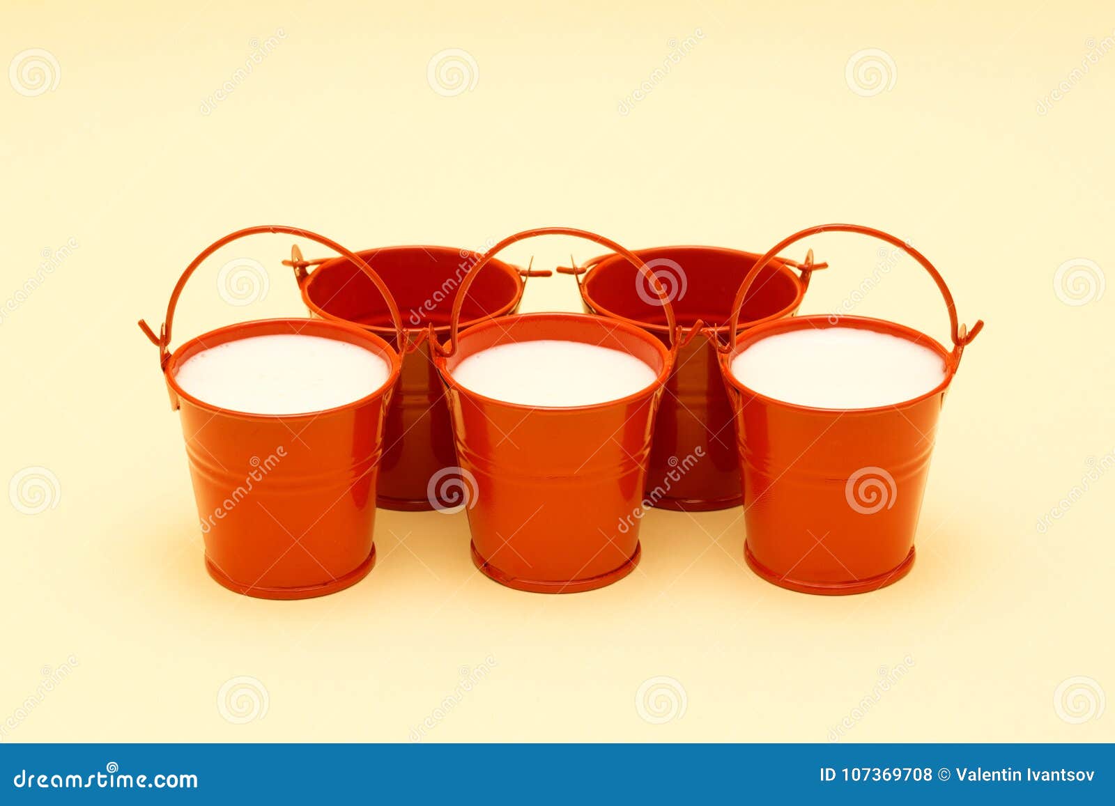 Two Buckets Of Milk In The Hands Of A Miller Of Cows. Organic Food ...