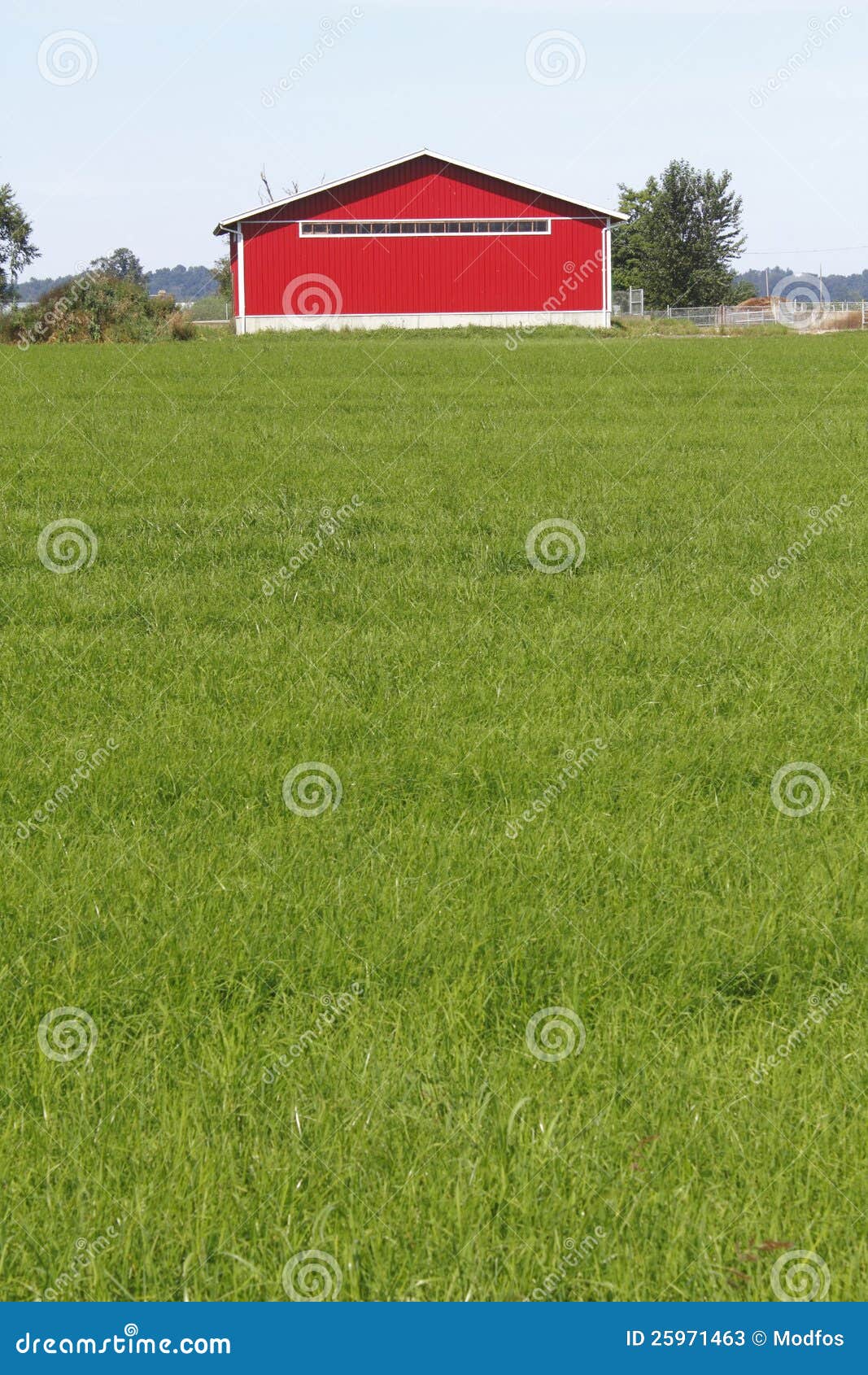 Red building, green field stock image. Image of utility - 25971463