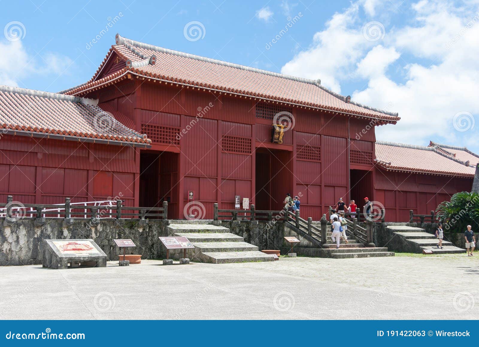 Red Building in Naha, Japan Under Blue Sky and White Clouds Editorial ...