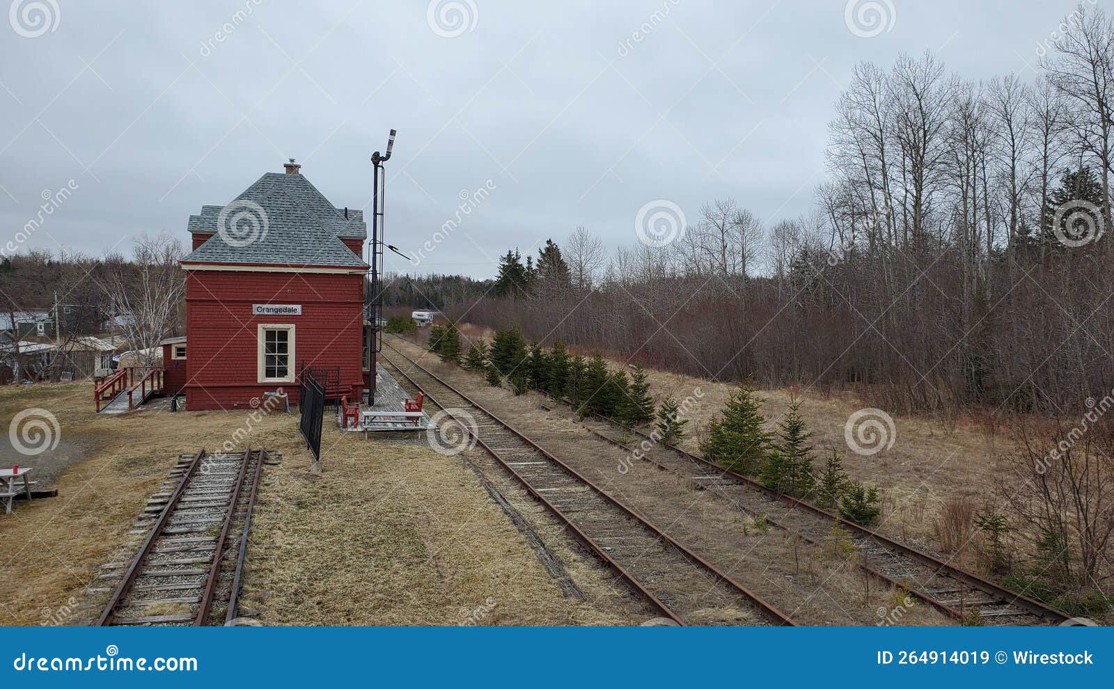 Red Building Next To a Train Track Stock Image - Image of railway ...