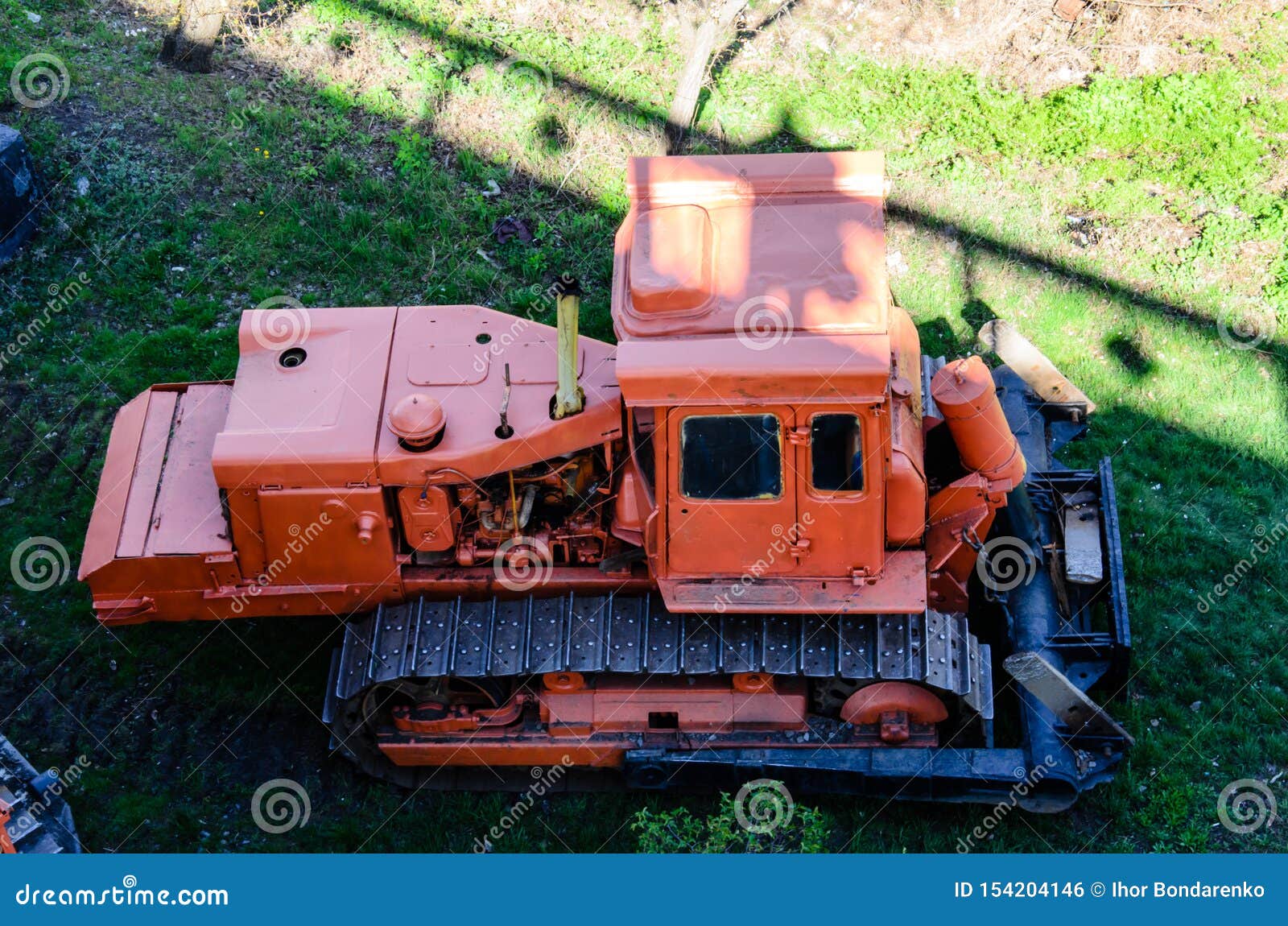 Red Bulldozer at a Construction Site Stock Photo - Image of caterpillar ...