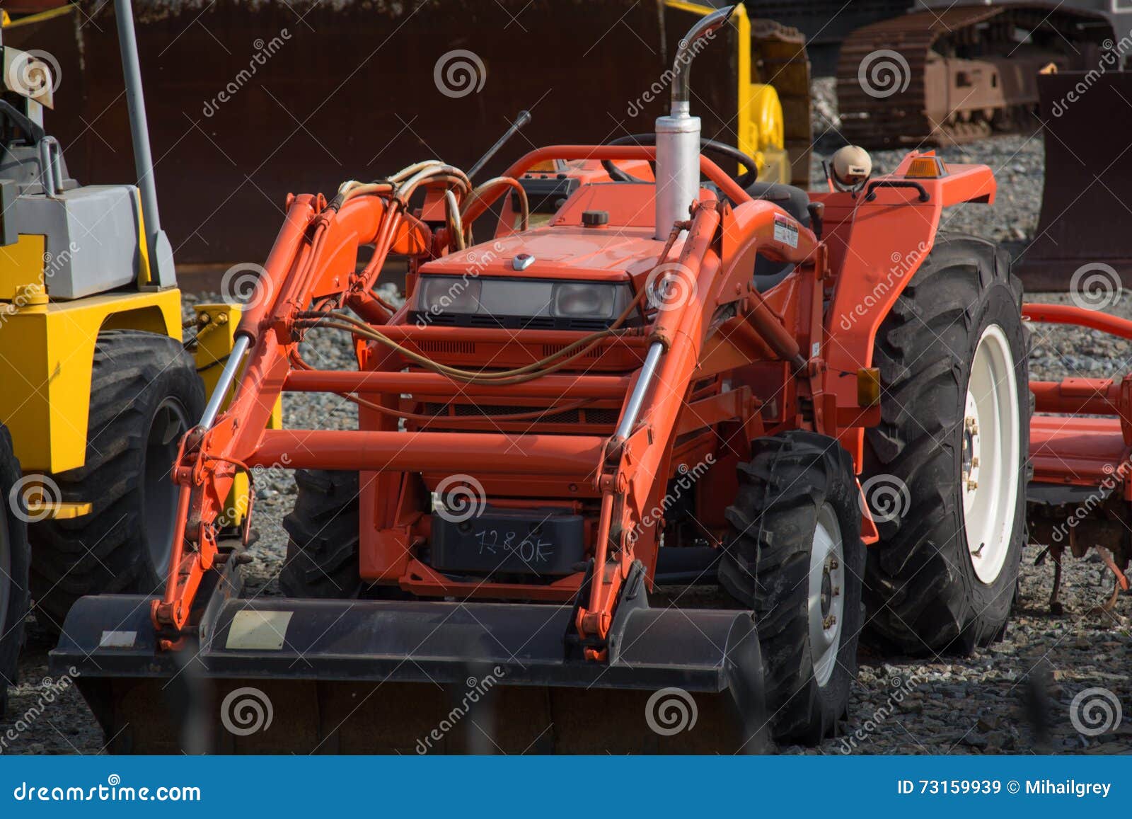 Red Bulldozer at a Parking Lot Stock Image - Image of eathmoving ...
