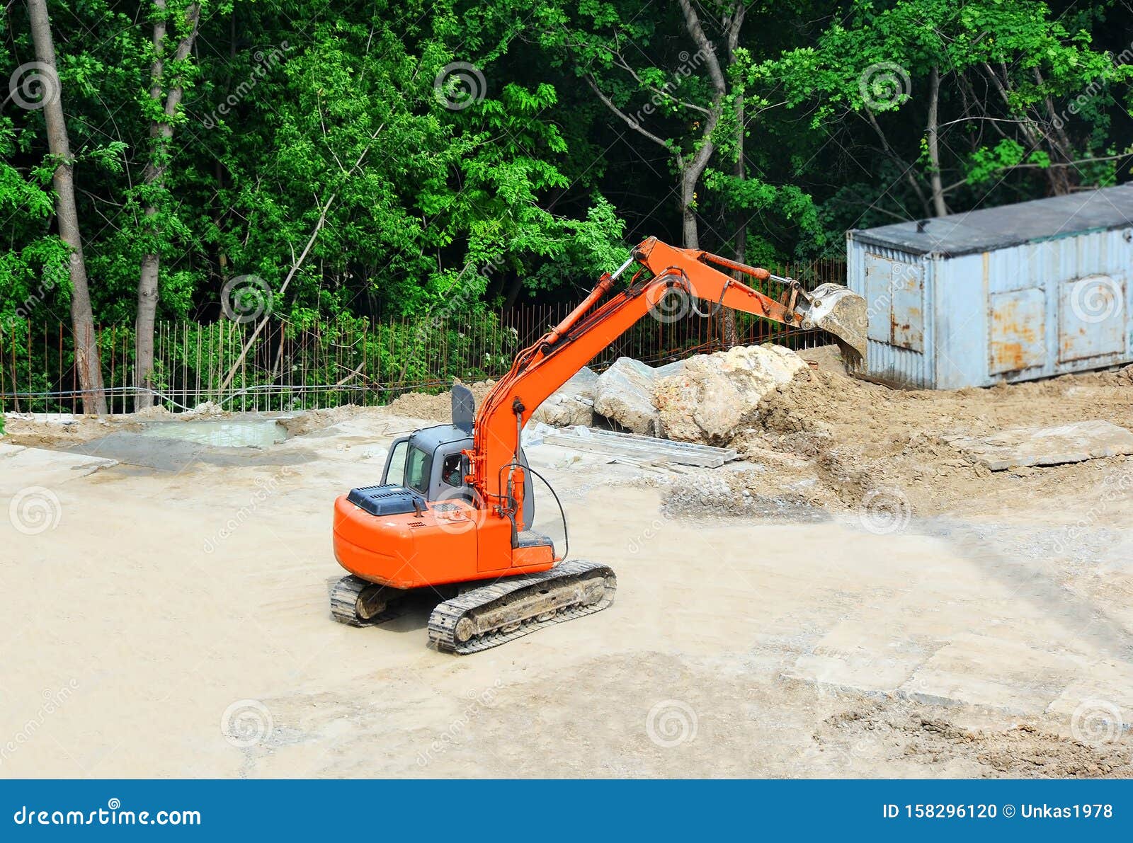 Red bulldozer at work stock photo. Image of bucket, dirt - 158296120