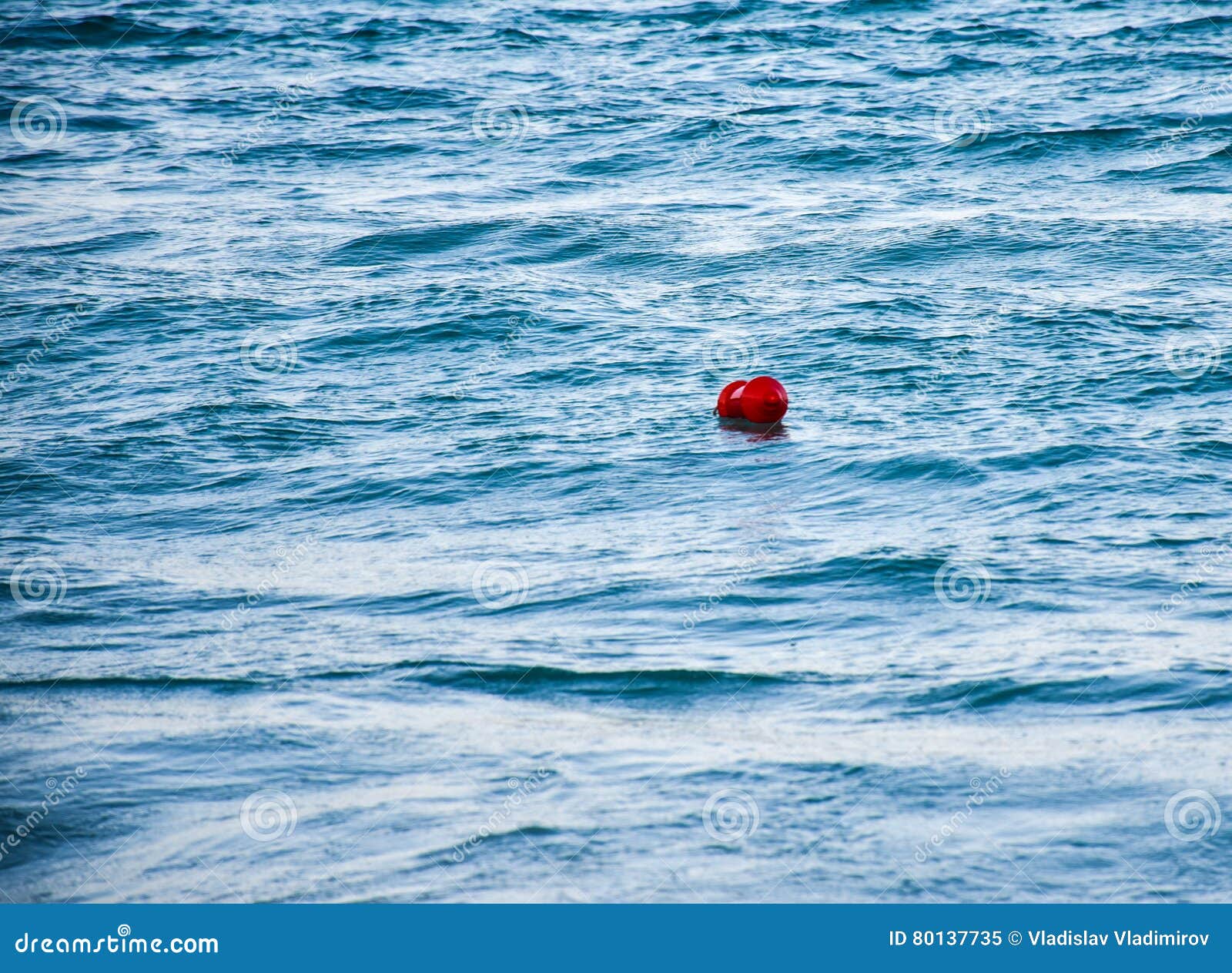 Red Buoy Floating on the Blue Sea Waves Stock Image - Image of rippled ...