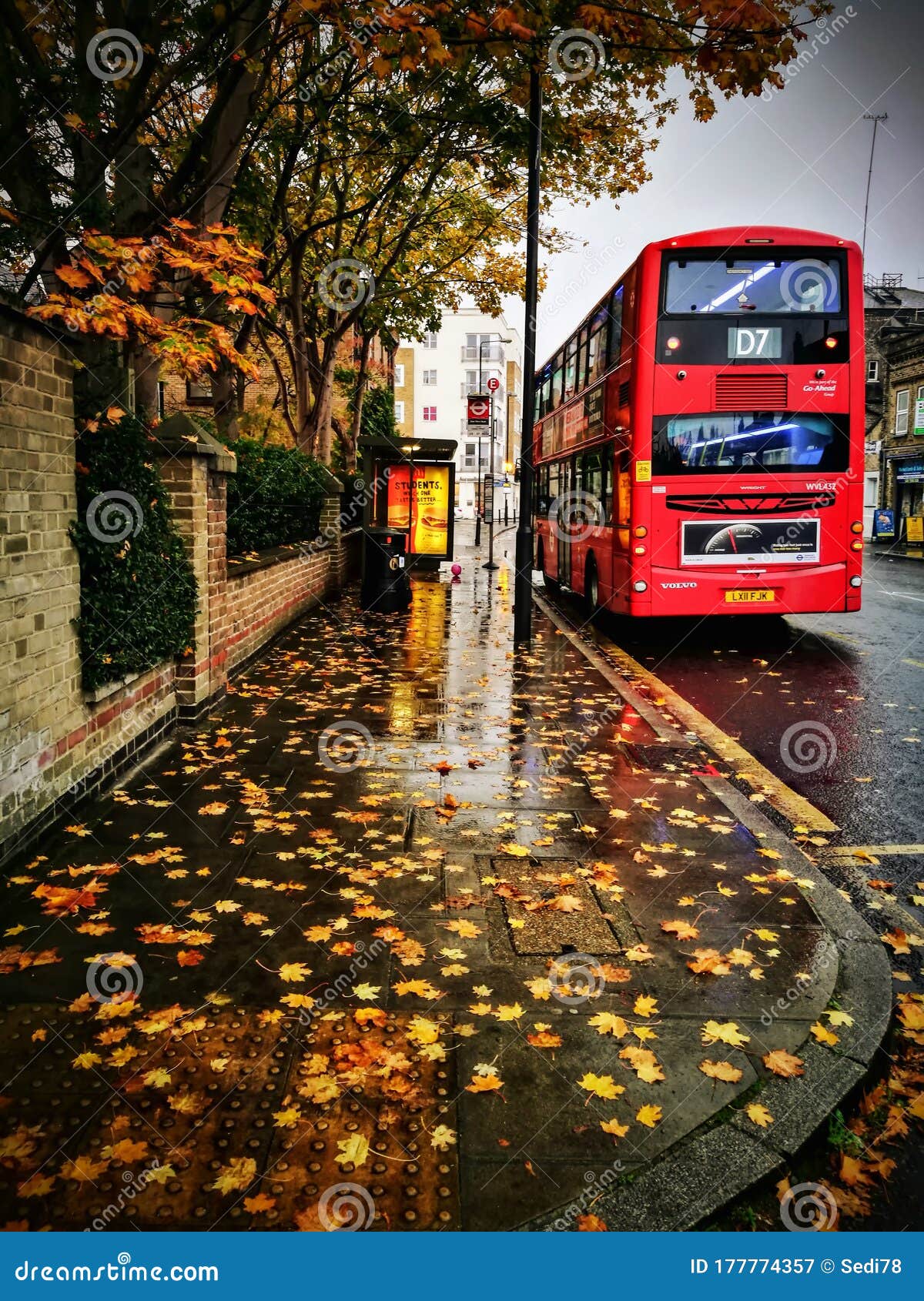 Red bus london at bus stop editorial photography. Image of time - 177774357